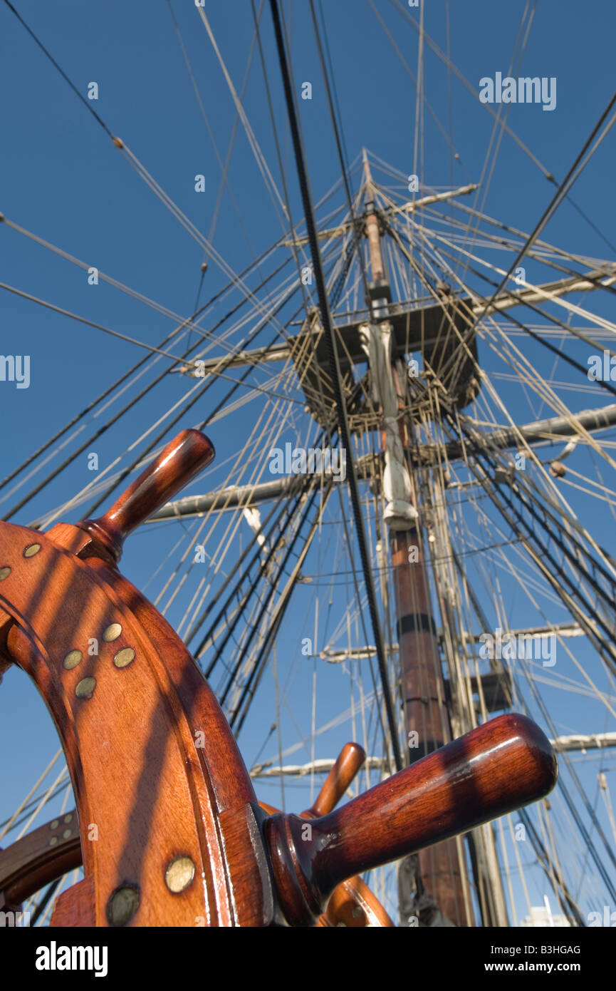 Wheel, masts, and rigging of an old tall sailing ship Stock Photo - Alamy