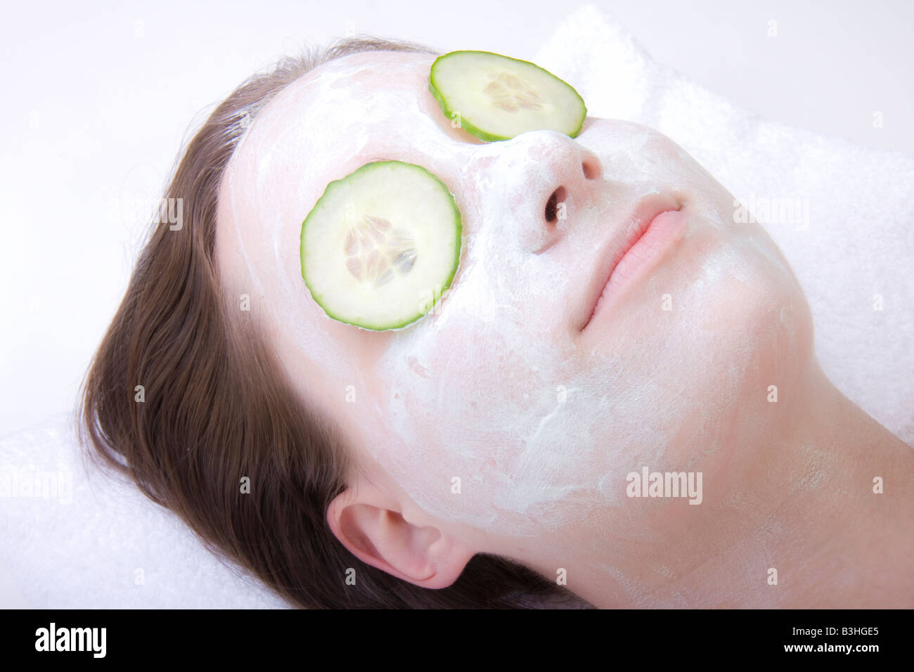 young woman with cucumber face mask Stock Photo - Alamy