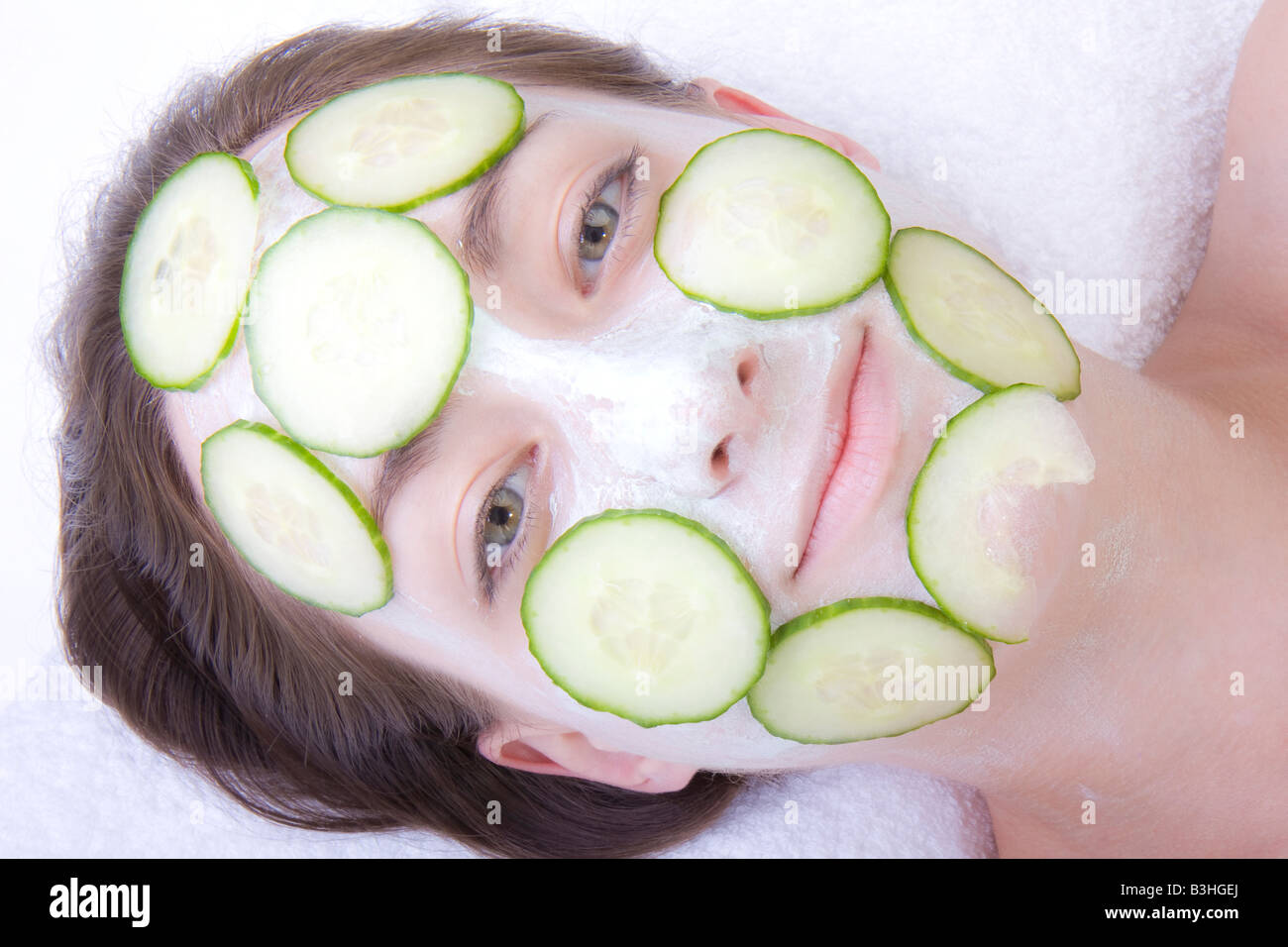 young woman with cucumber face mask Stock Photo - Alamy