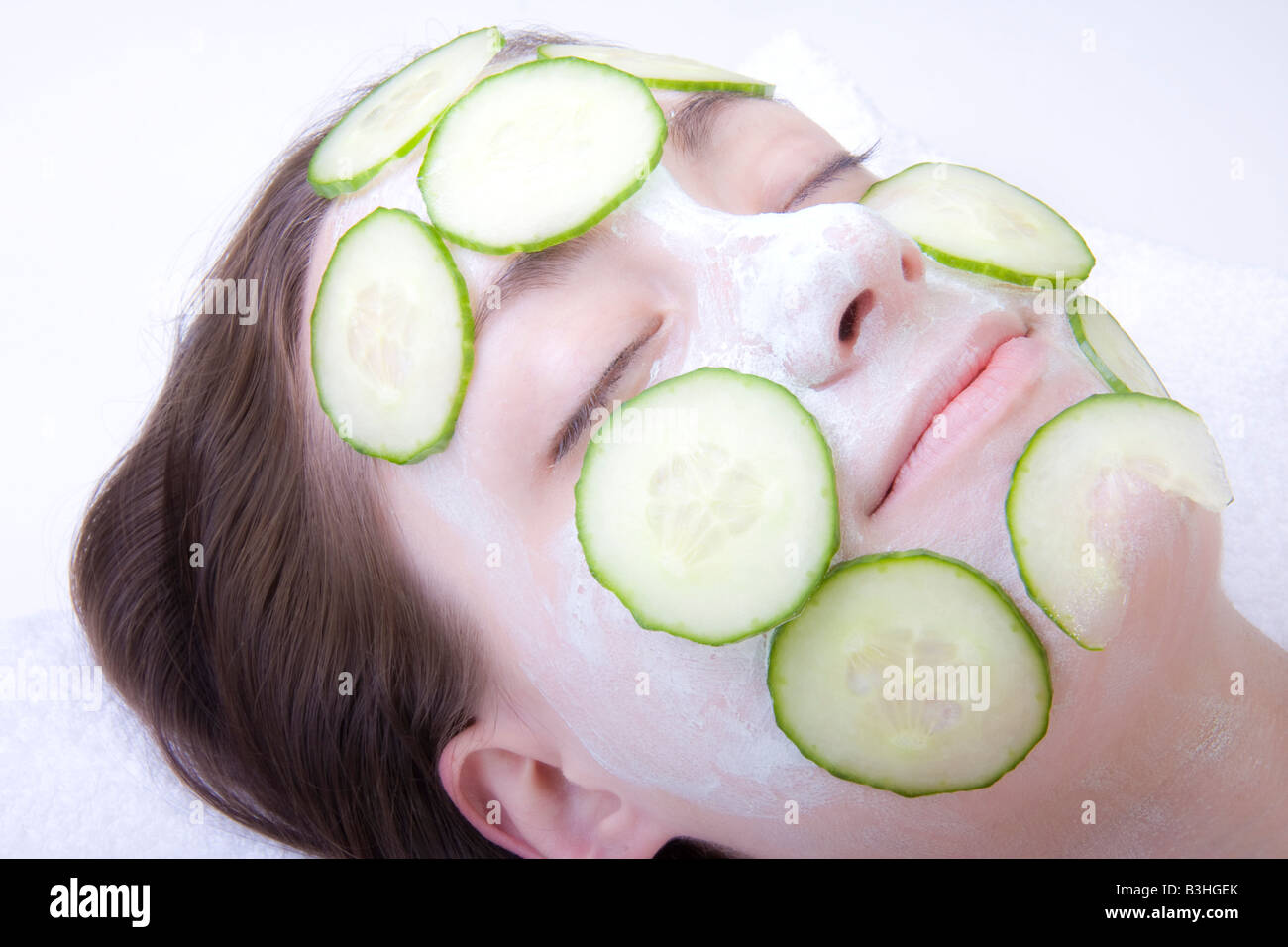 young woman with cucumber face mask Stock Photo - Alamy