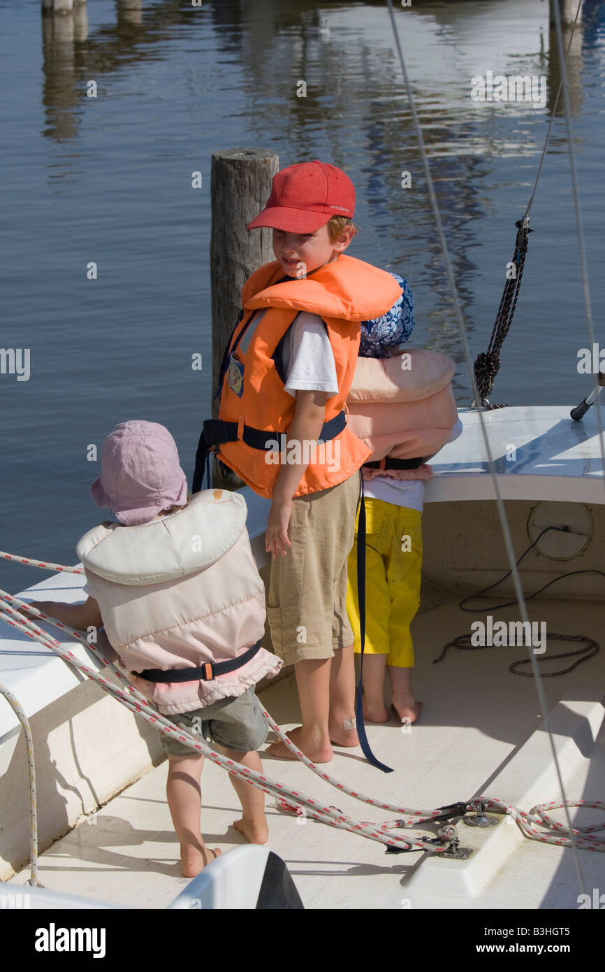 children in sailing boat Stock Photo - Alamy