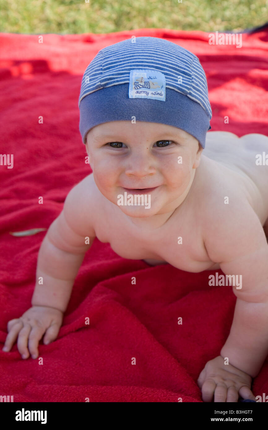 baby crawling on cover Stock Photo - Alamy