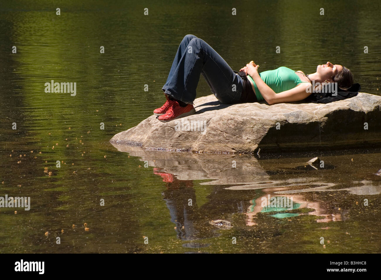 Young, relaxing woman Stock Photo - Alamy