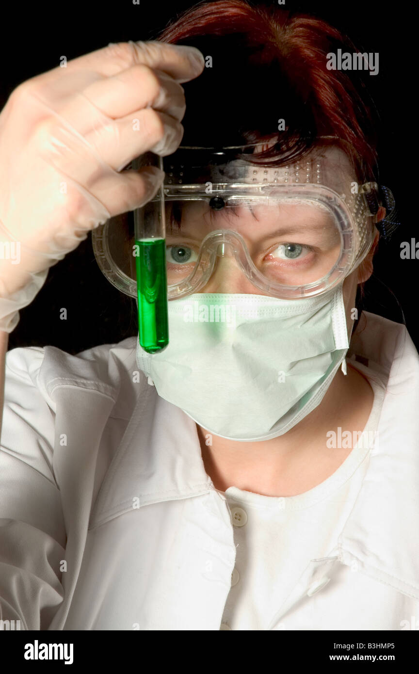 female operator with a test tube Stock Photo - Alamy