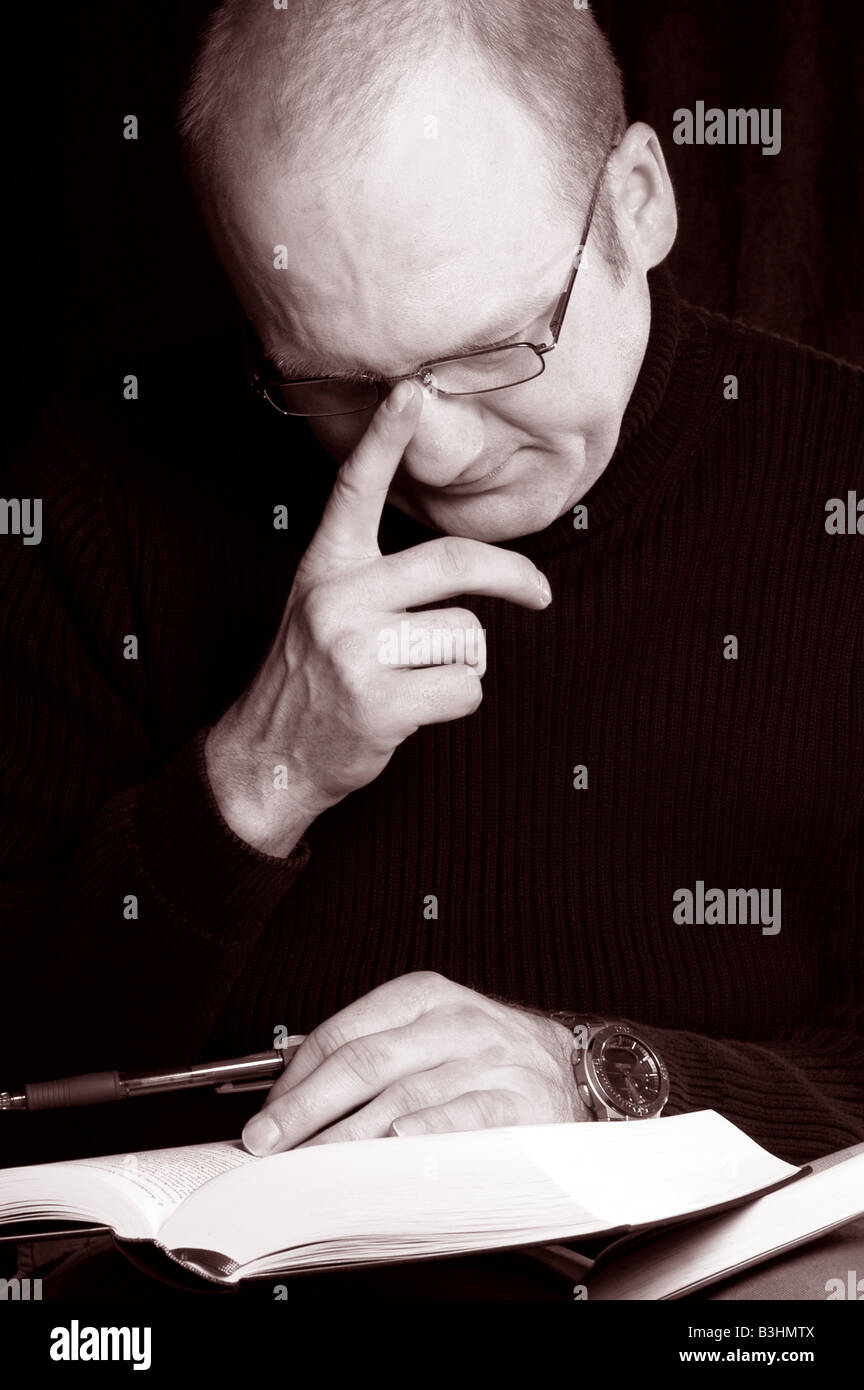 man with a book Stock Photo - Alamy