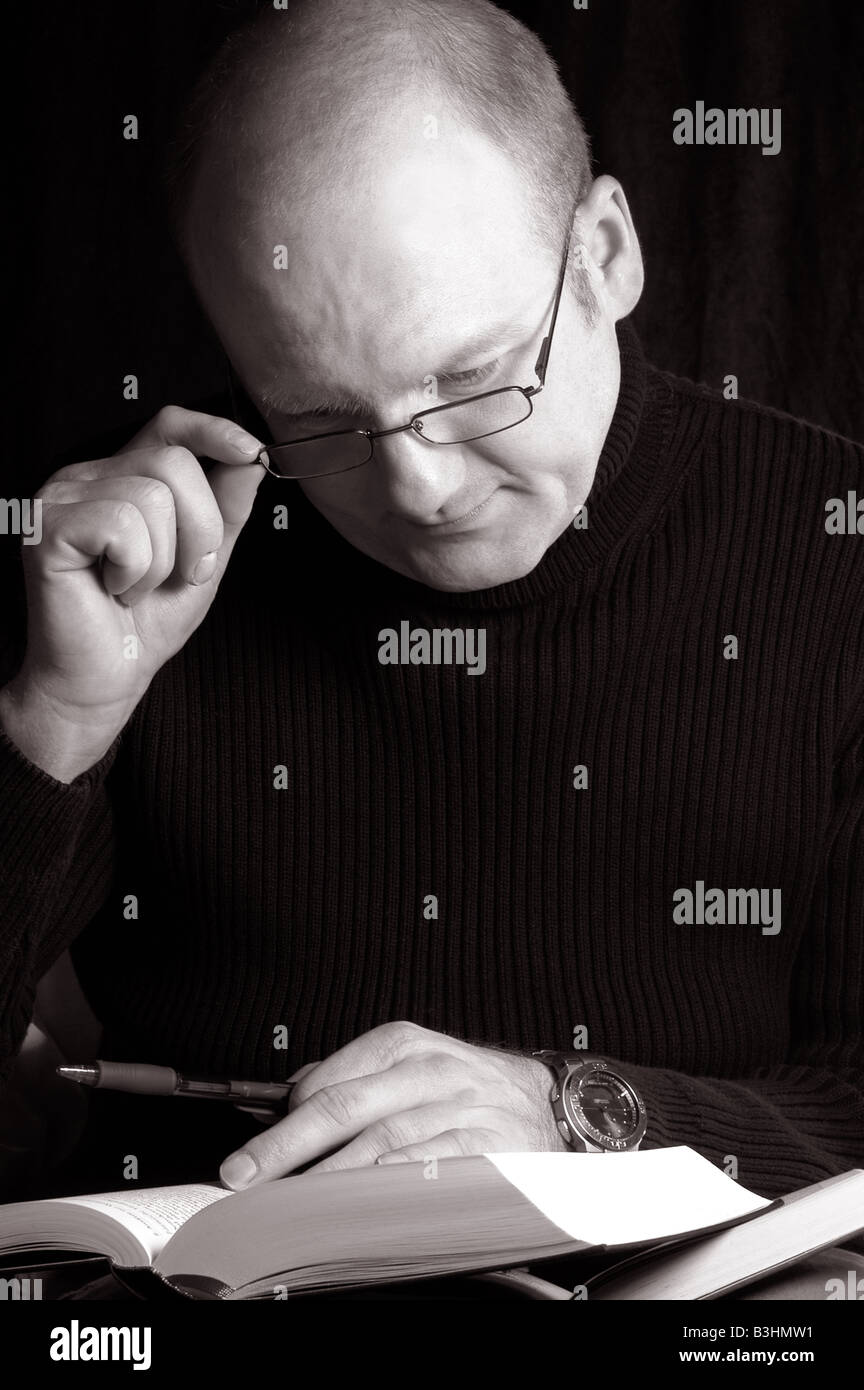 man with a book Stock Photo - Alamy
