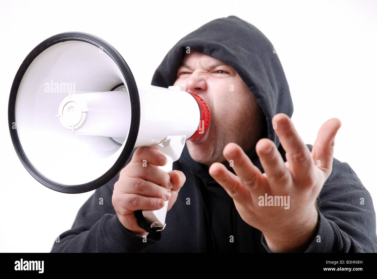 a man using a megaphone Stock Photo - Alamy