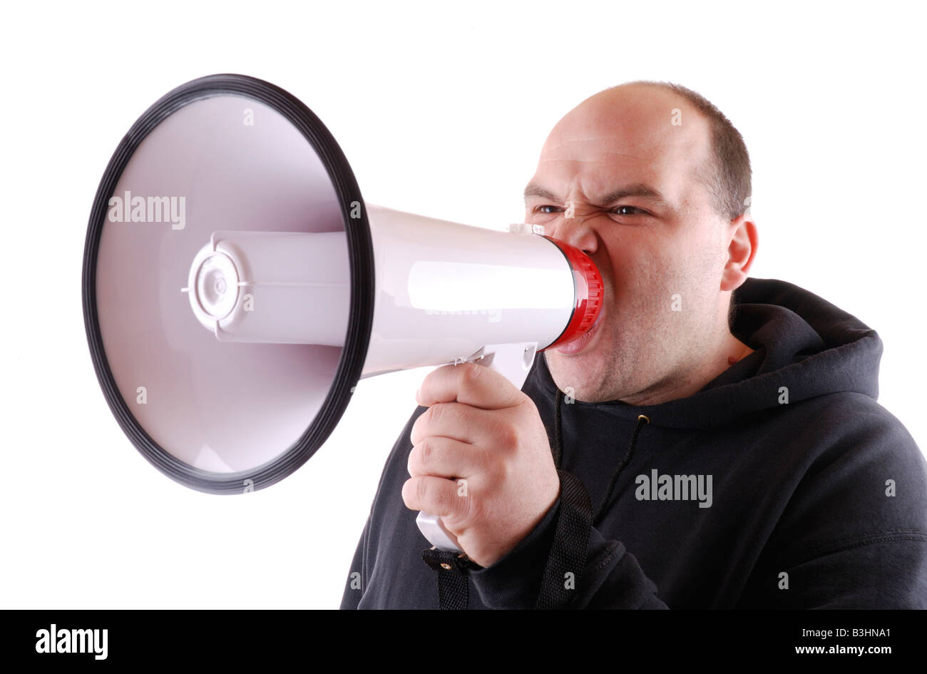a man using a megaphone Stock Photo - Alamy