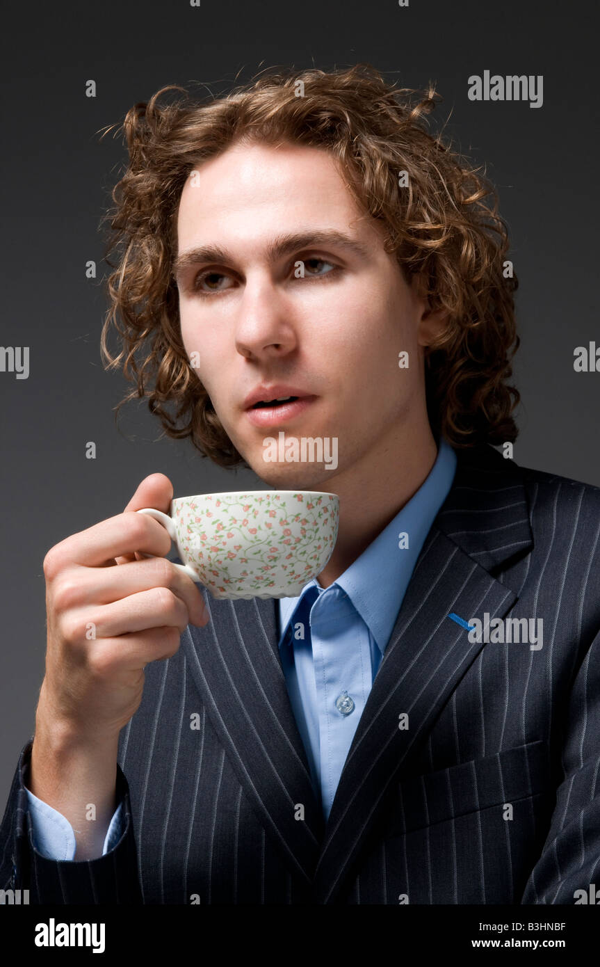 Man with a cup of coffee Stock Photo - Alamy