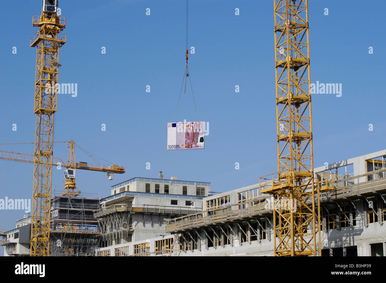 photomontage Euro banknotes with construction crane Stock Photo - Alamy