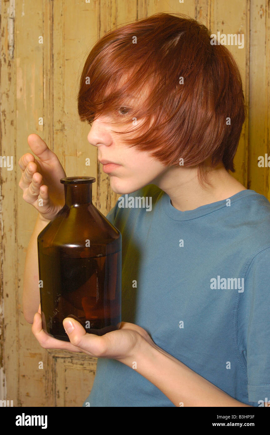 Pupil makes a smelling test in the chemical class Stock Photo - Alamy