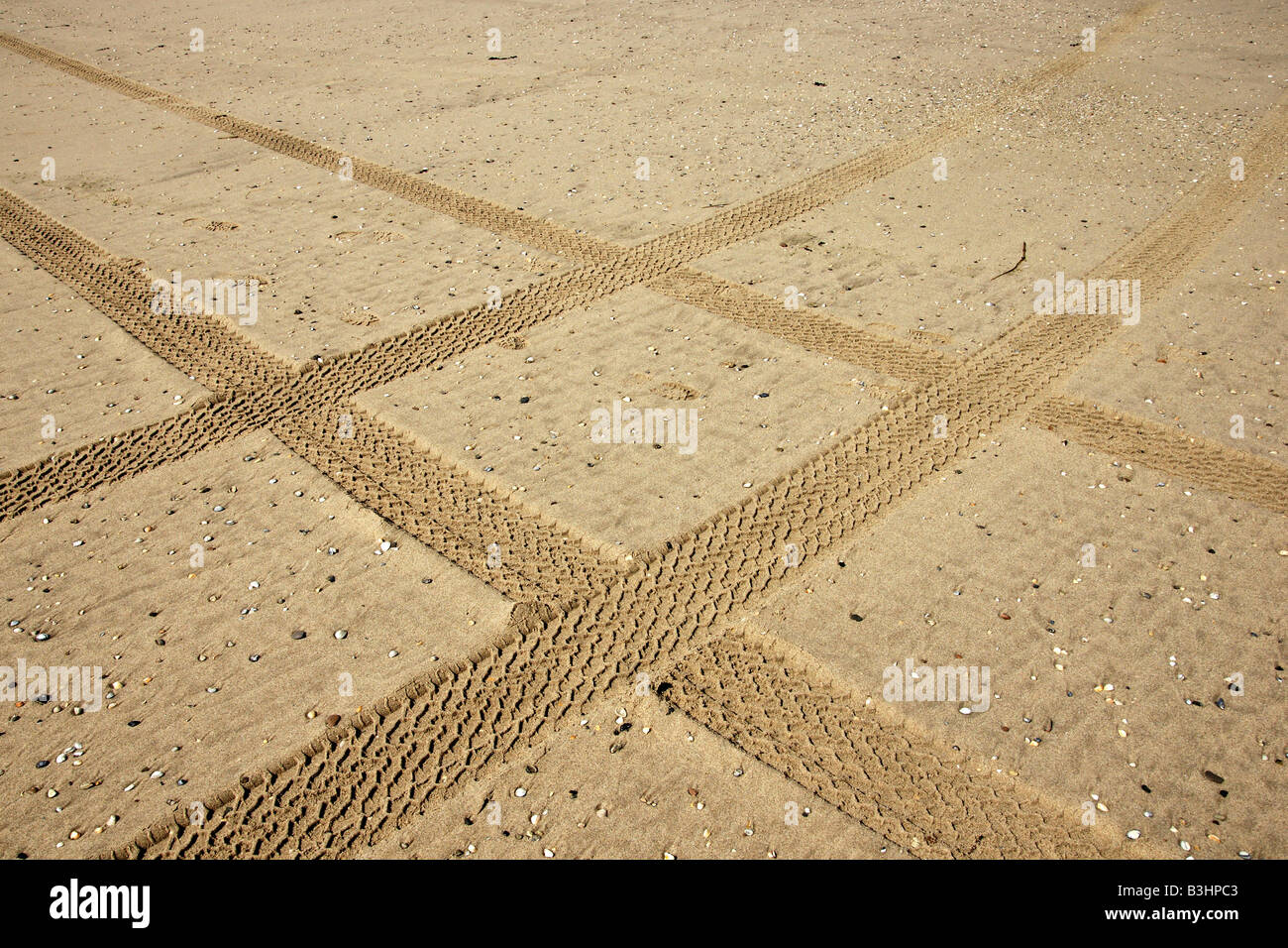 car tyre tracks crossing sand beach empty image cross four ...