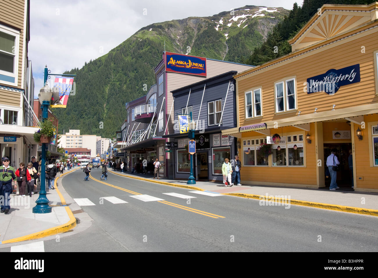 People strawling the streets of down town Juneau, The Capital of Alaska ...