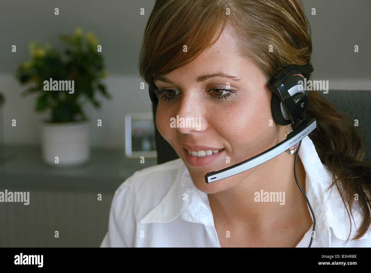 Woman with Headset Stock Photo - Alamy