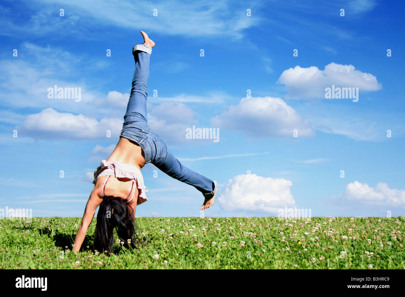 Woman makes air jump Stock Photo - Alamy