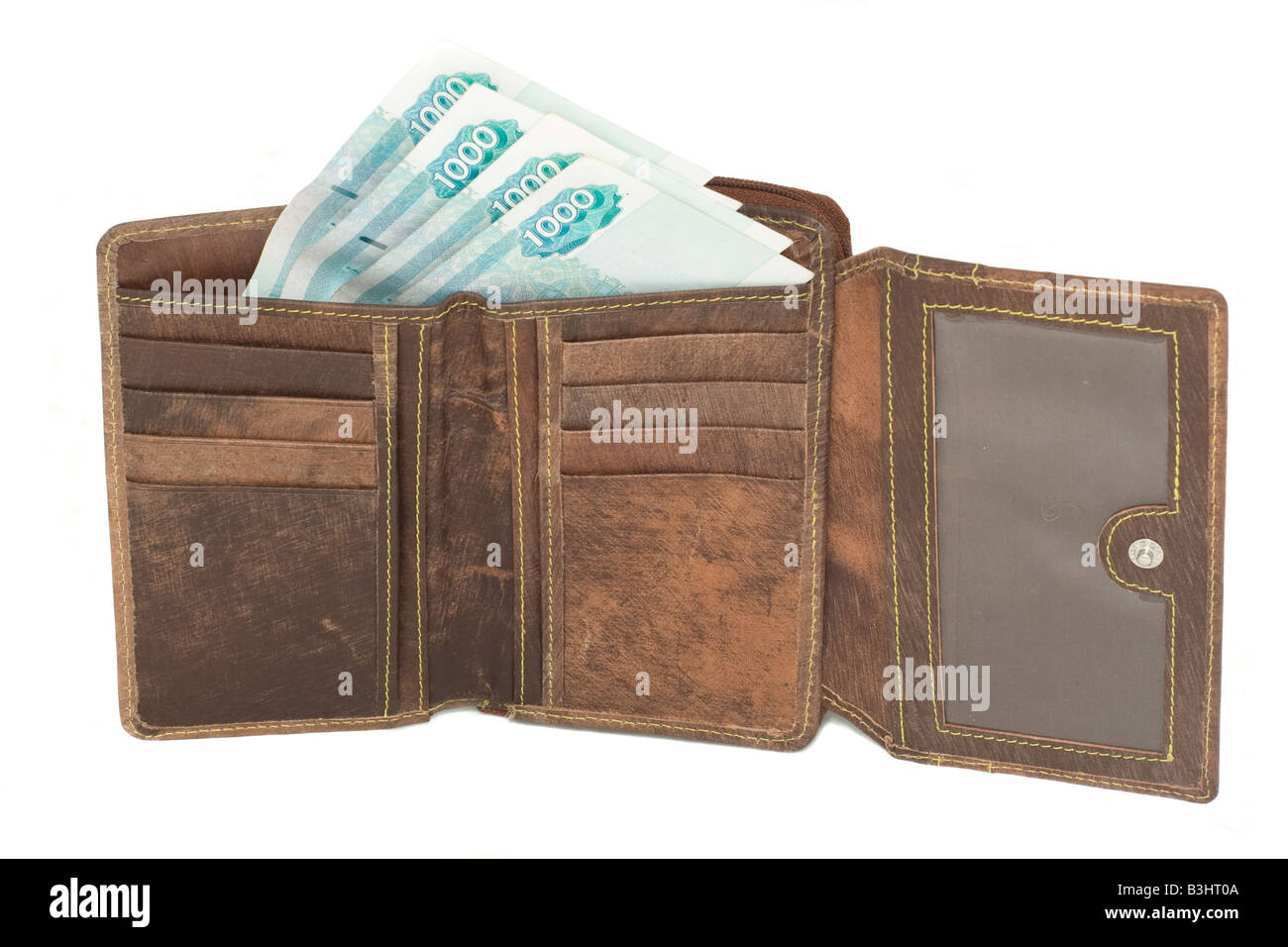 Brown leather wallet with some russian bank notes, isolated on white ...