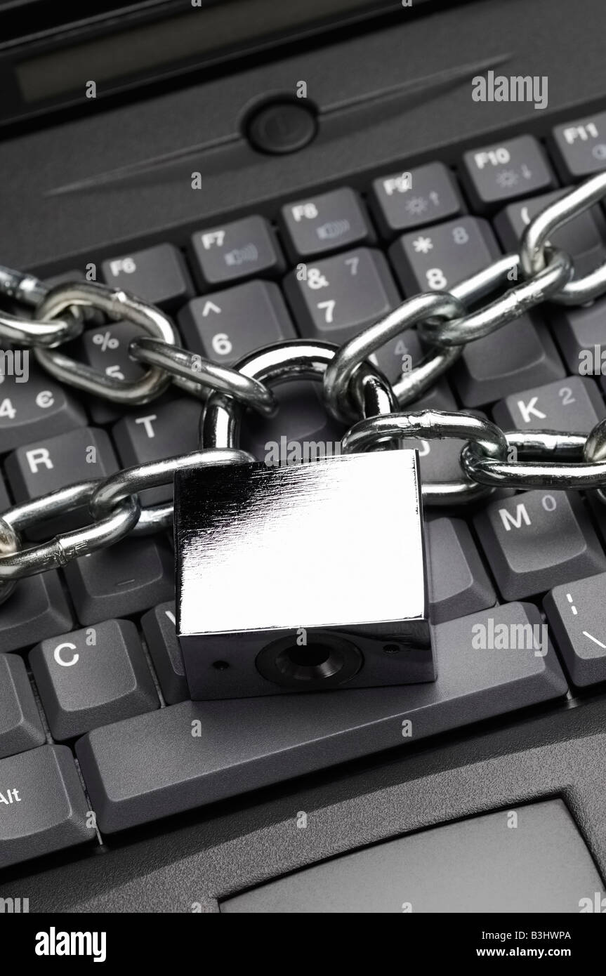 Padlock and Chain on Laptop Computer Keyboard Stock Photo - Alamy
