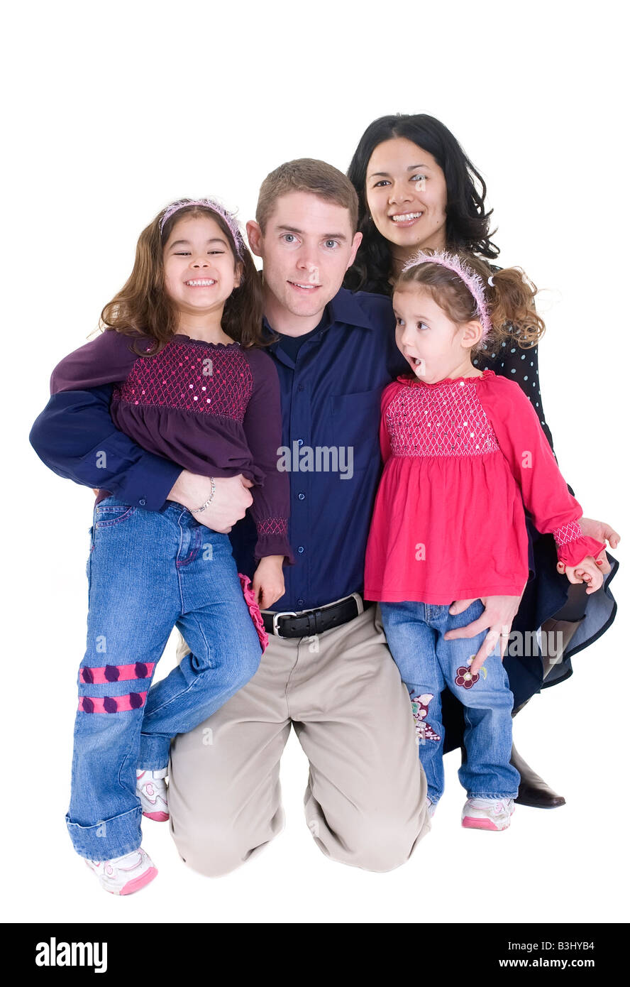 A happy family of four Bonding Love marriage children Stock Photo - Alamy