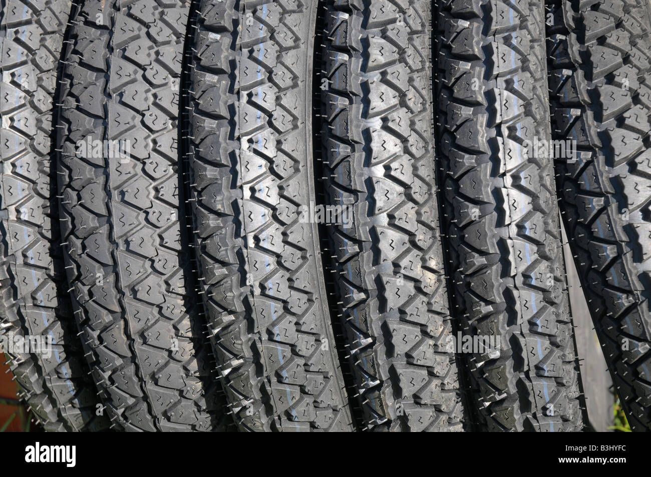 a stack of scooter tyres Stock Photo - Alamy