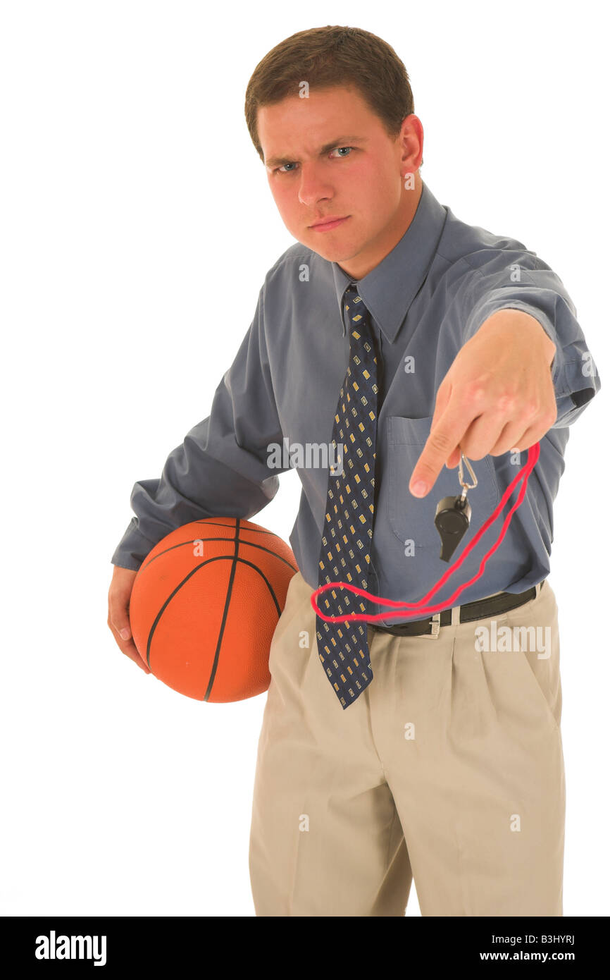 Man upset with basketball and whistle Stock Photo - Alamy