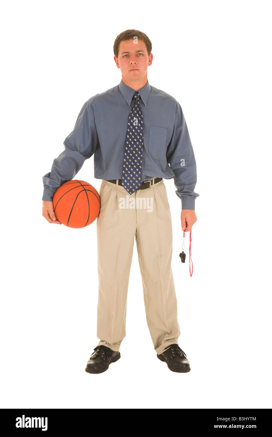 Man in formal wear holding basked ball and whistle Stock Photo - Alamy