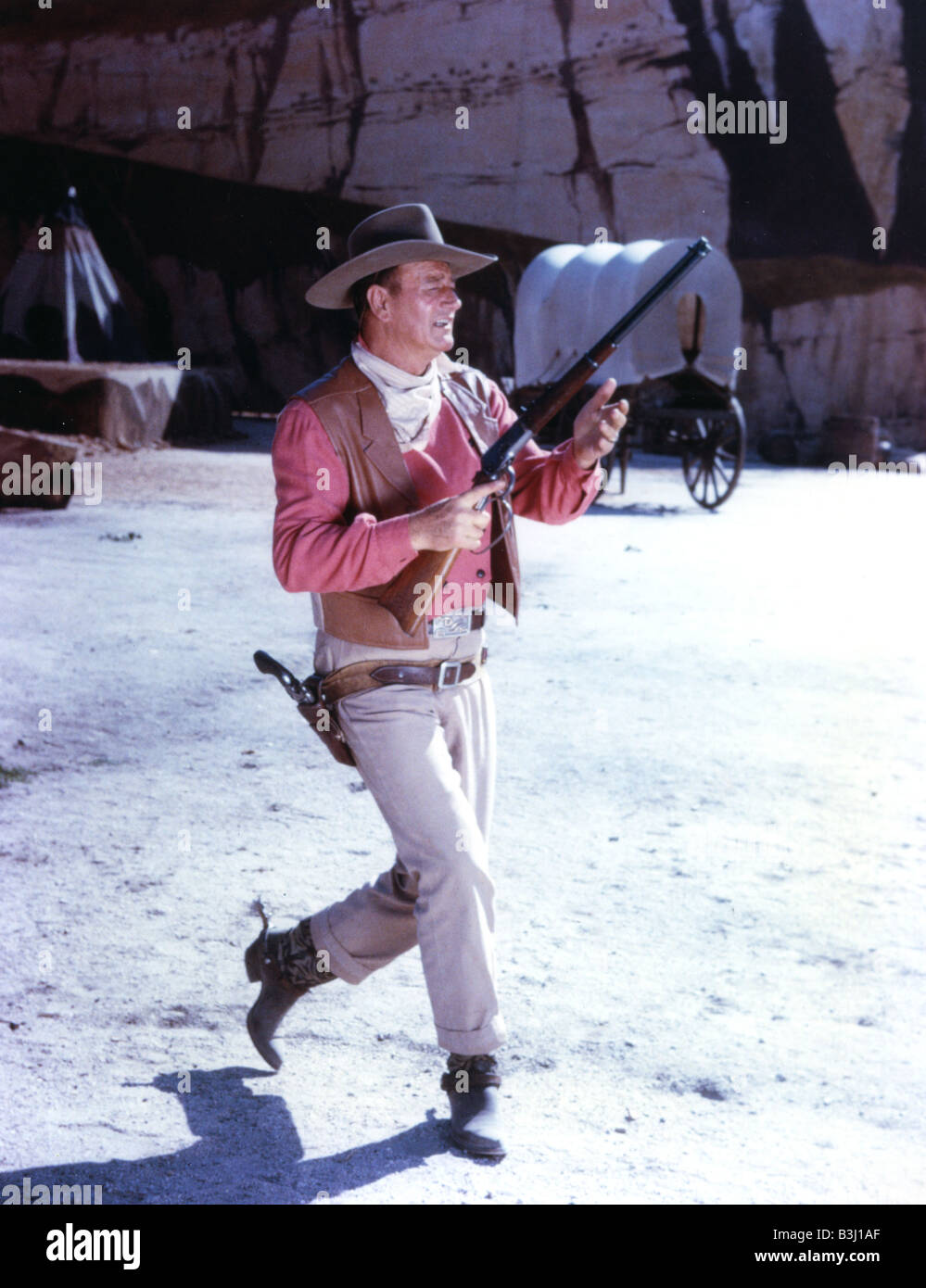 Cowboy with rifle hi-res stock photography and images - Alamy