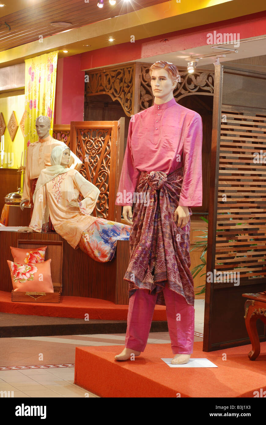 Malay traditional batik fashion display Stock Photo - Alamy