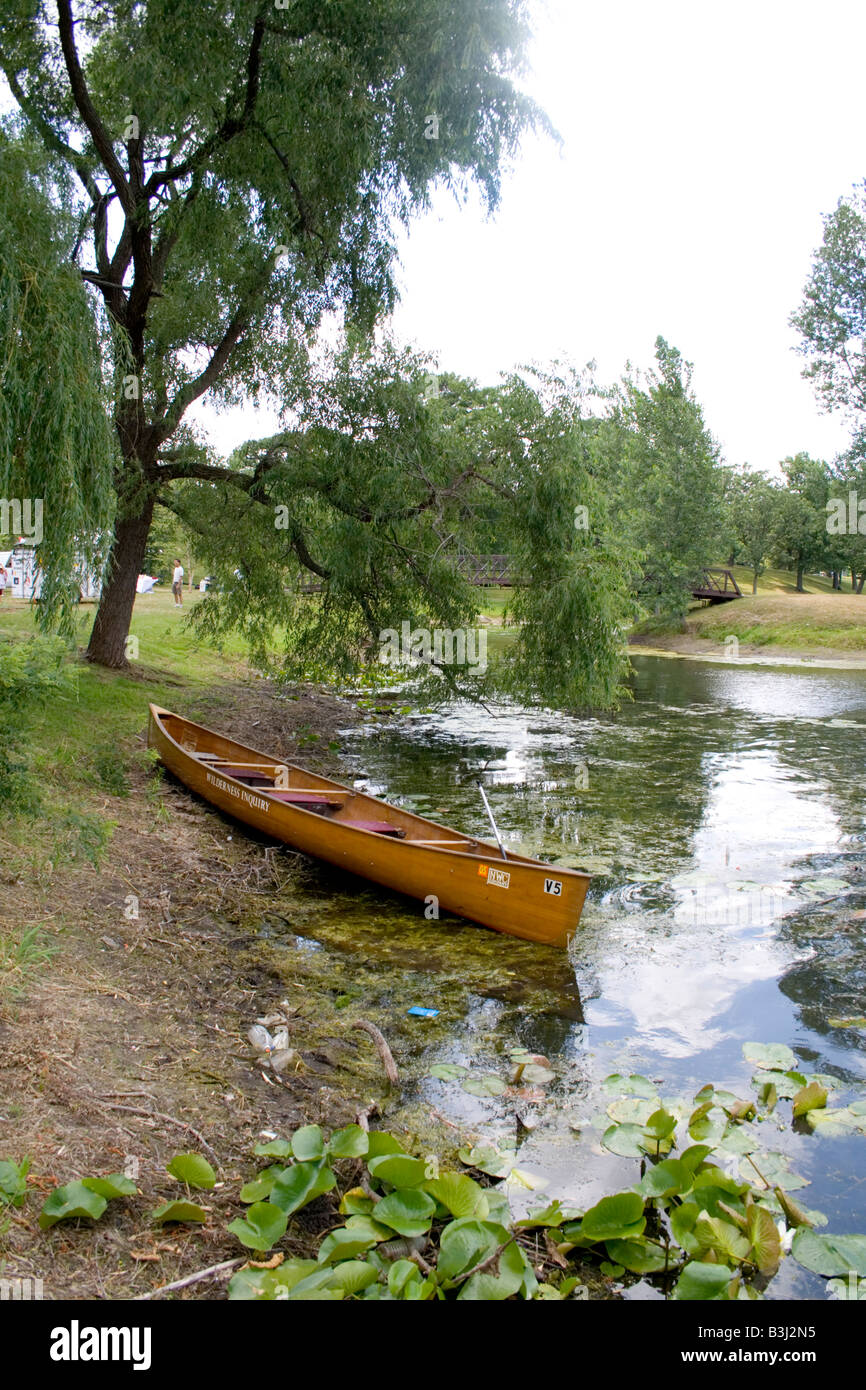 Wilderness Inquiry canoe beached along the beautiful Phalen Creek shore ...