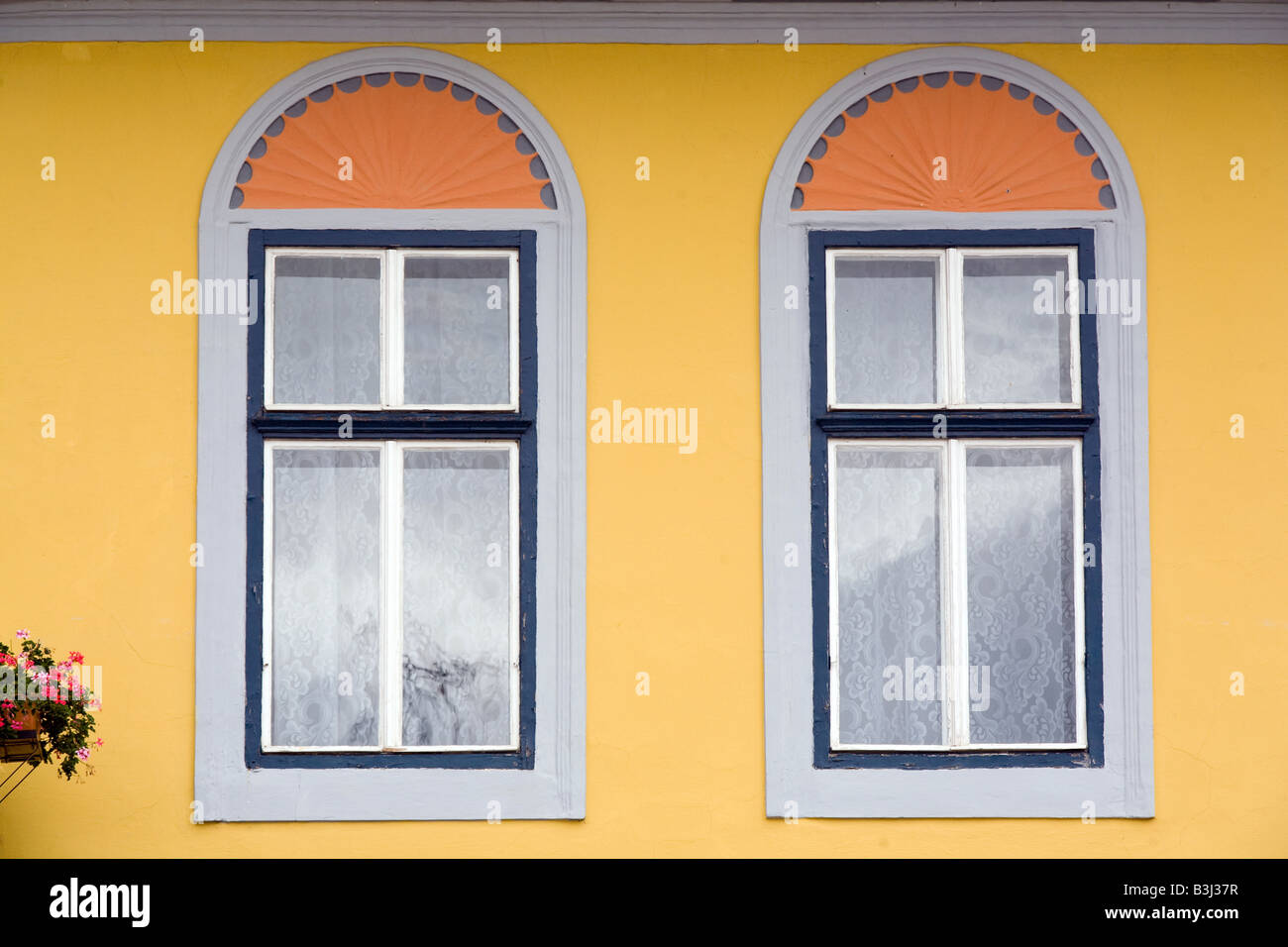 White windows with orange frame hi-res stock photography and images - Alamy