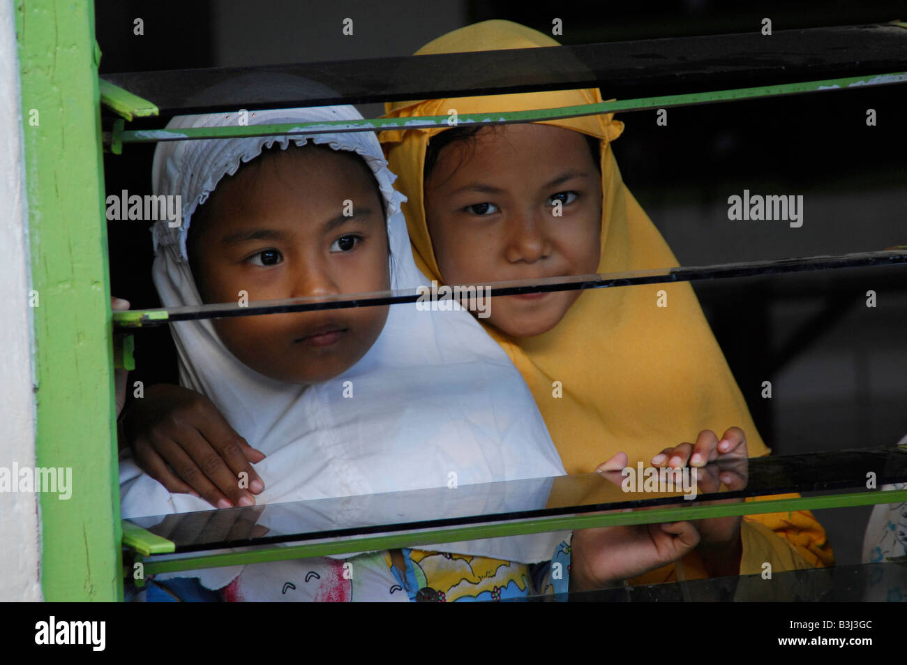 happy muslim children at the charity sponsored islamic school in slum ...