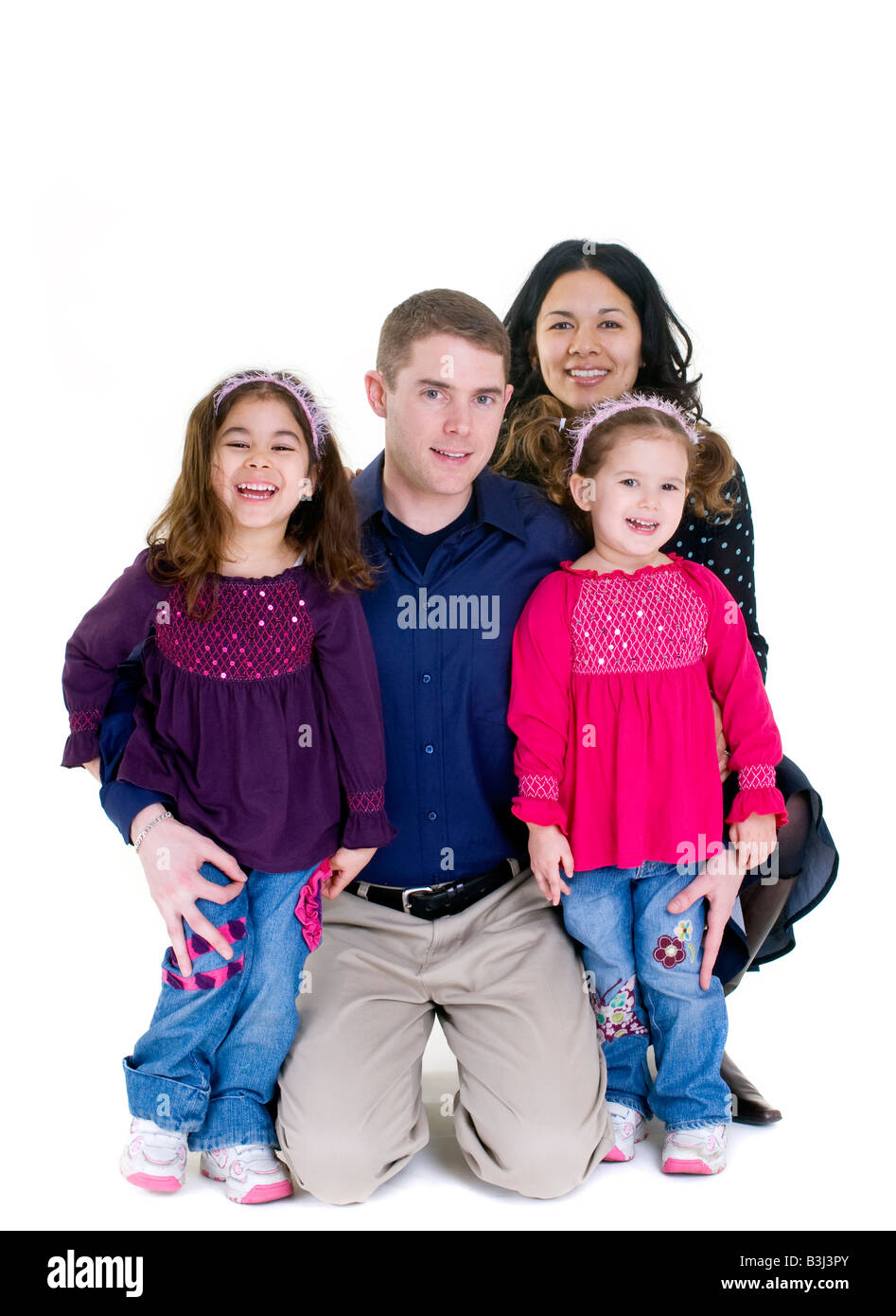 Happy ethnic family Cut Out Stock Images & Pictures - Alamy