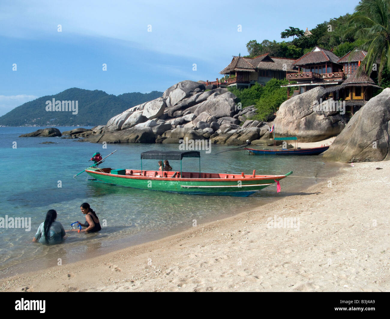 Two women on Jan Som beach, Koh Tao, Thailand Stock Photo - Alamy