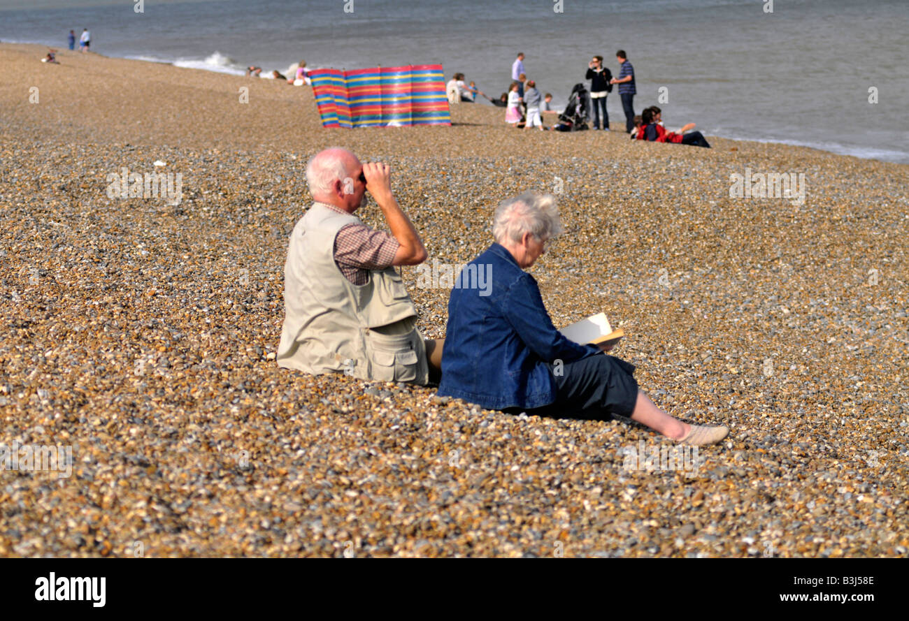 two elderly people on beach at aldeburgh Stock Photo - Alamy
