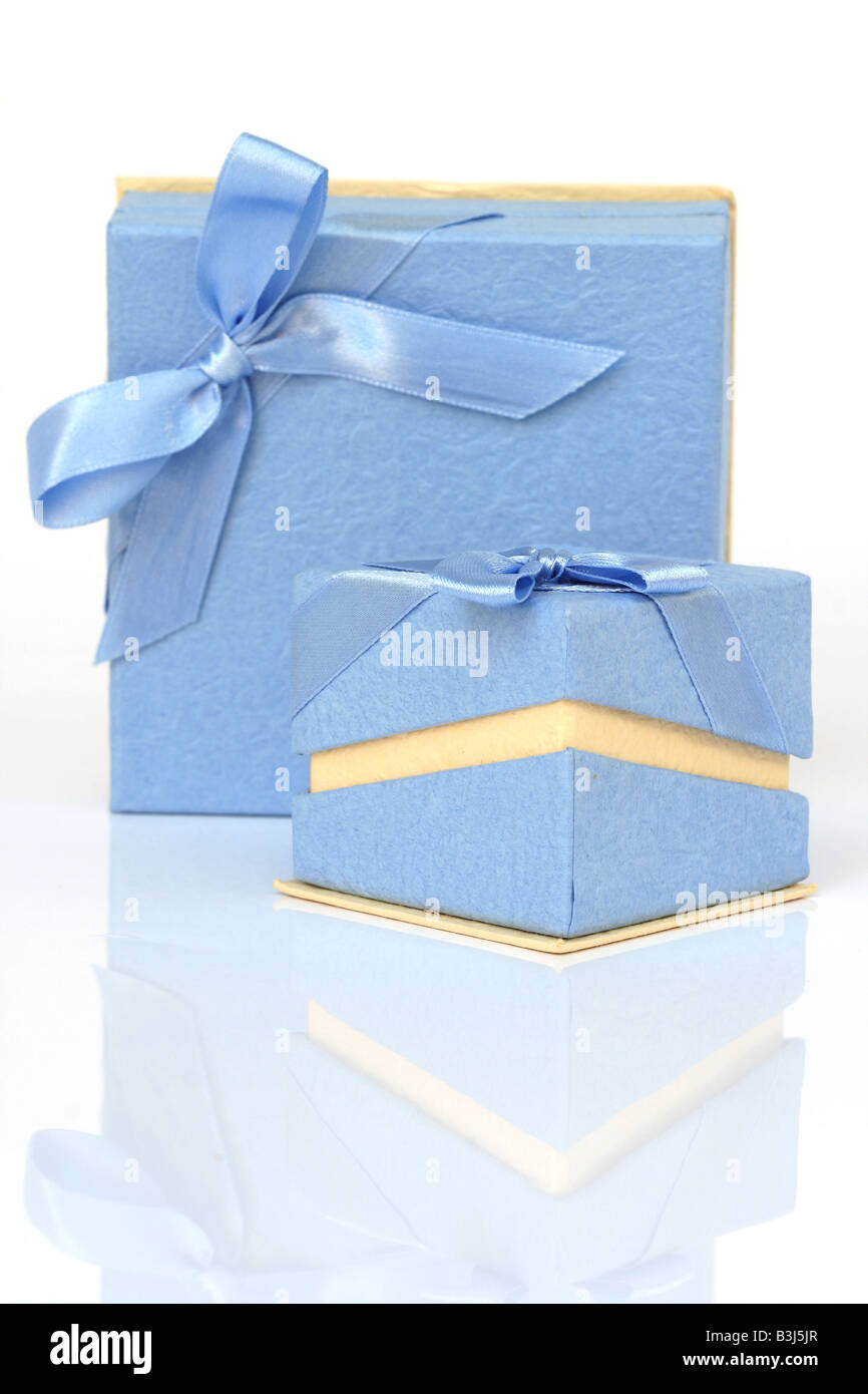 two cyan gift boxes with reflection isolated on white Stock Photo - Alamy