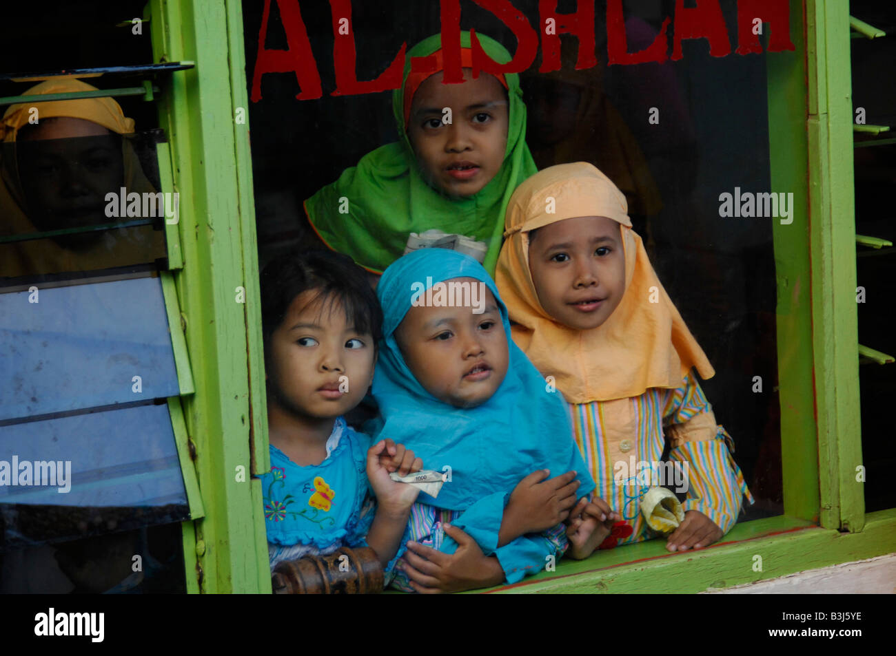 happy muslim children at the charity sponsored islamic school in slum ...