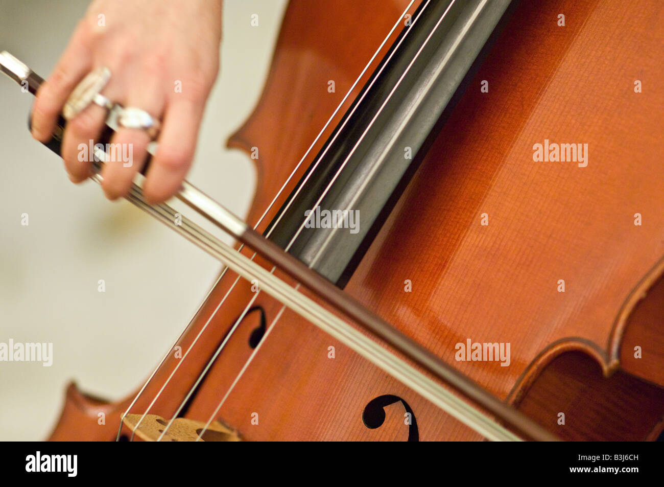 Cellist hand hi-res stock photography and images - Alamy