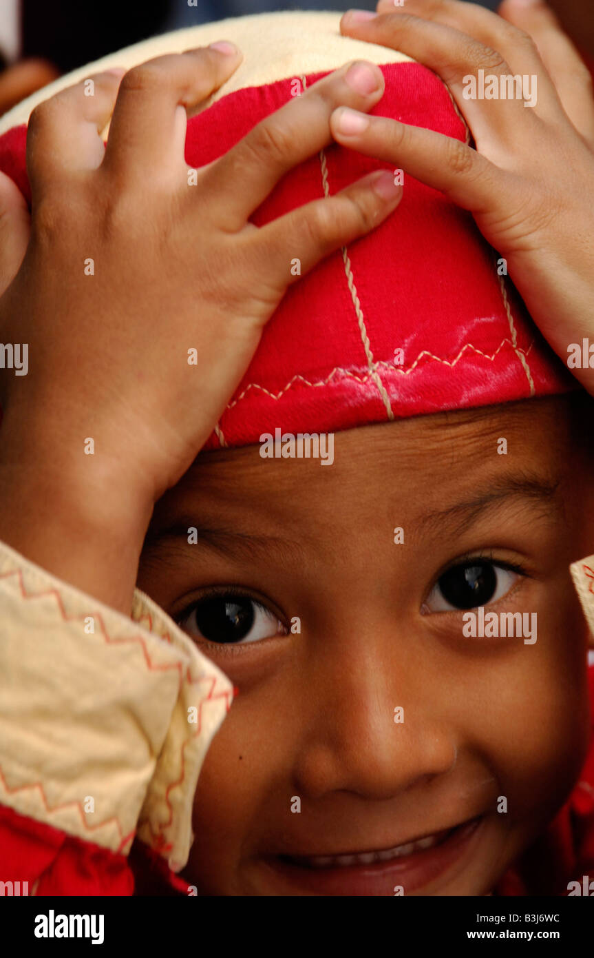 happy muslim boy at the charity sponsored islamic school in slum ...