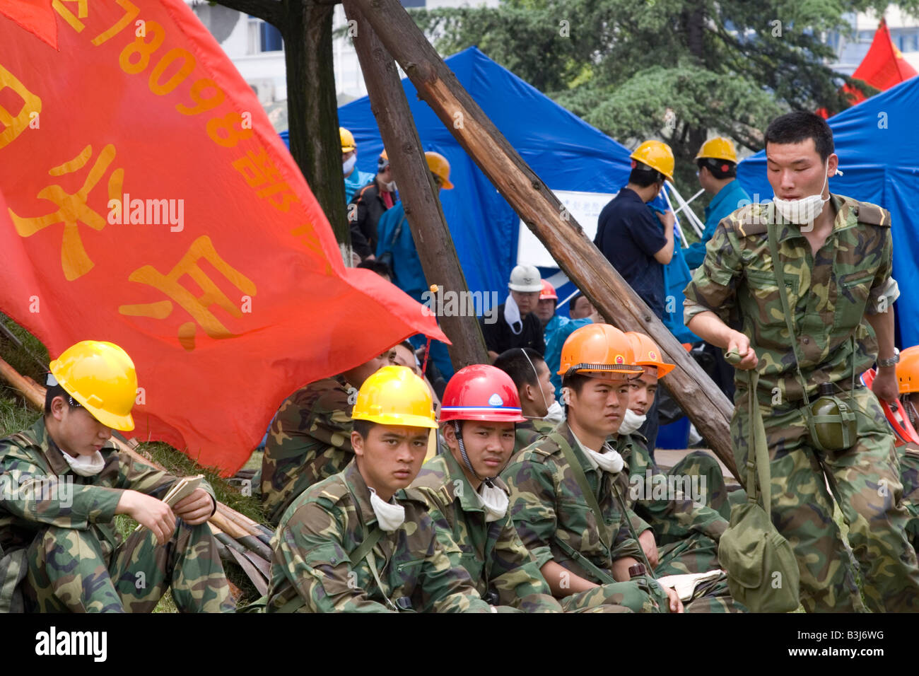 Soldiers involved in the rescue effort after the massive earthquake of ...