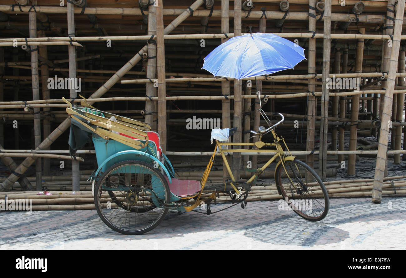 bicycle rickshaw with bamboo scaffolding Macau China April 2008 Stock ...