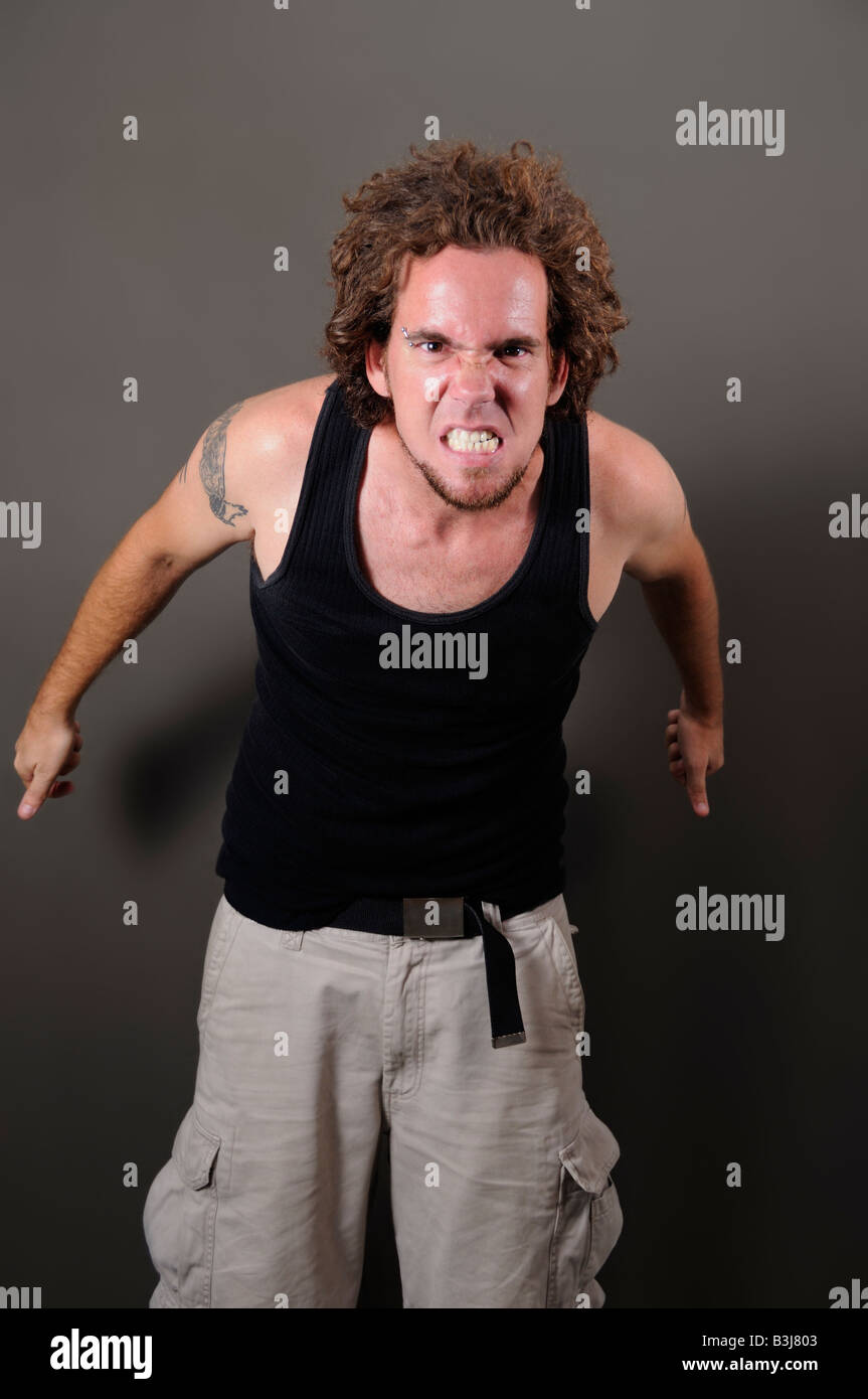 Angry guy making face hi-res stock photography and images - Alamy