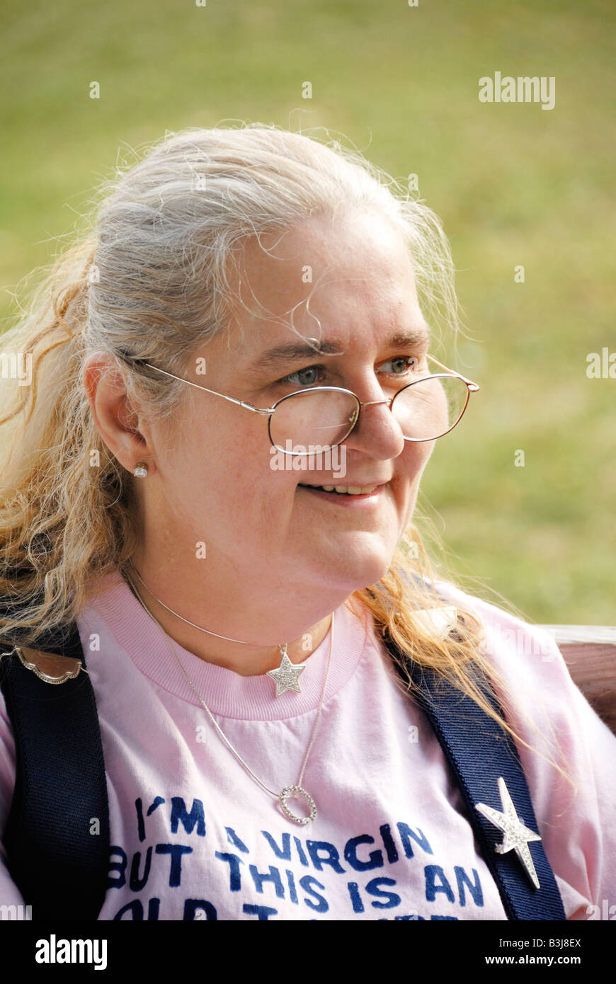 Woman sitting looking off into distance hi-res stock photography and ...