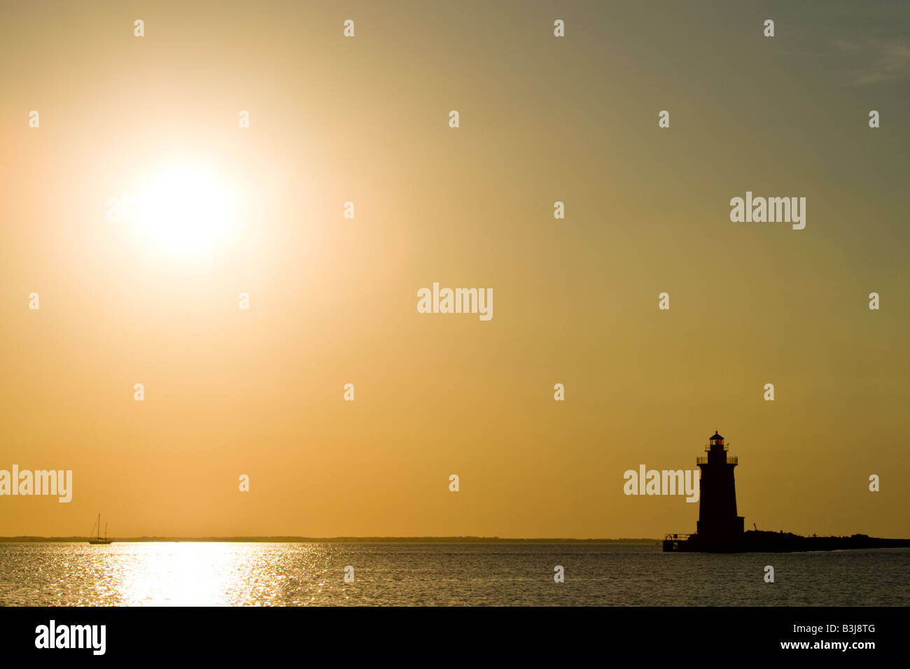 The Breakwater Lighthouse on the Delaware Bay at sunset Stock Photo - Alamy