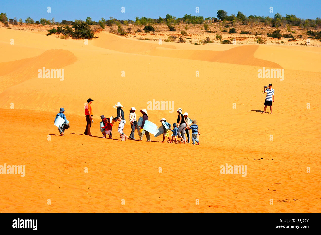 Tourists explore the sand dunes of Mui Ne, Viet Nam Stock Photo - Alamy