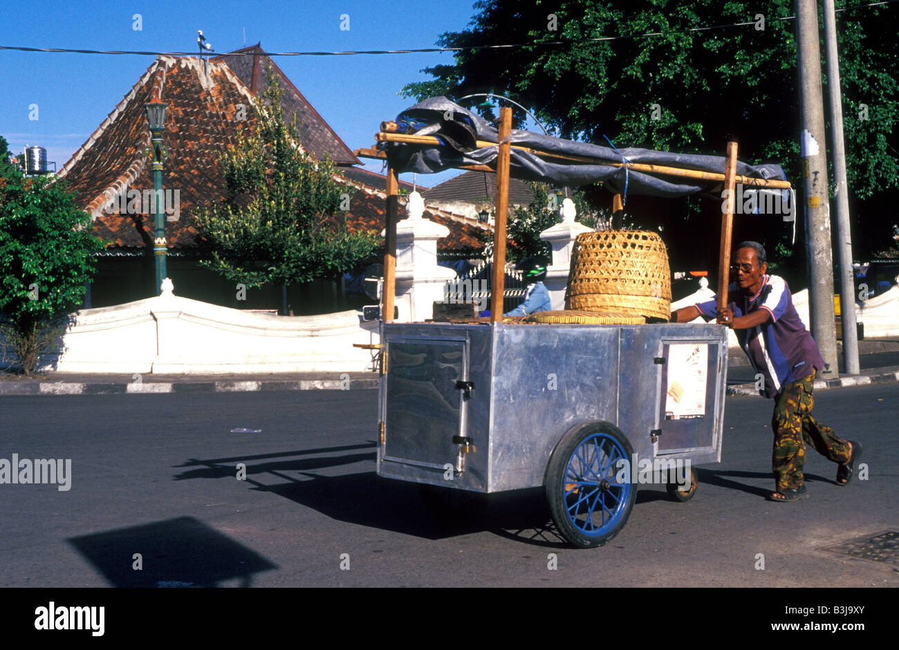 hawker with mobile stall yogyakarta java indonesia Stock Photo - Alamy
