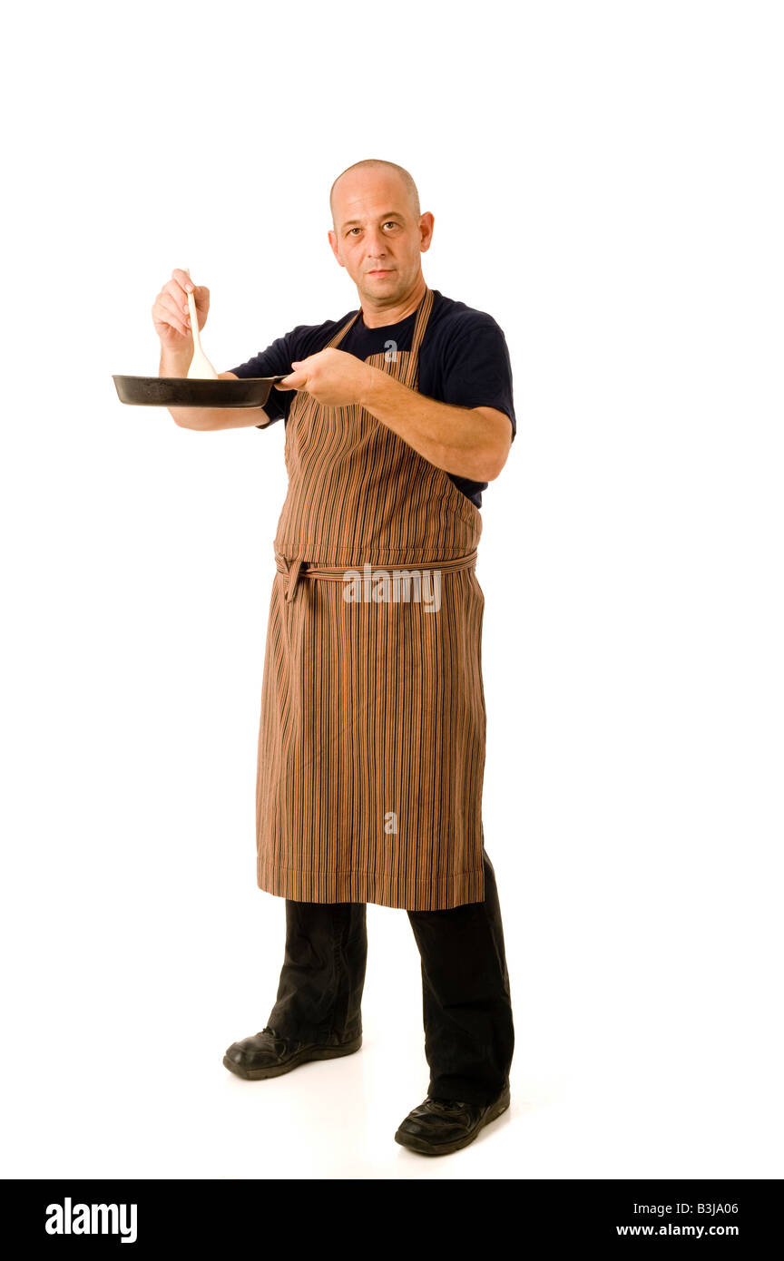 man in his 40 with apron and cooking utensils isolated on white Stock ...
