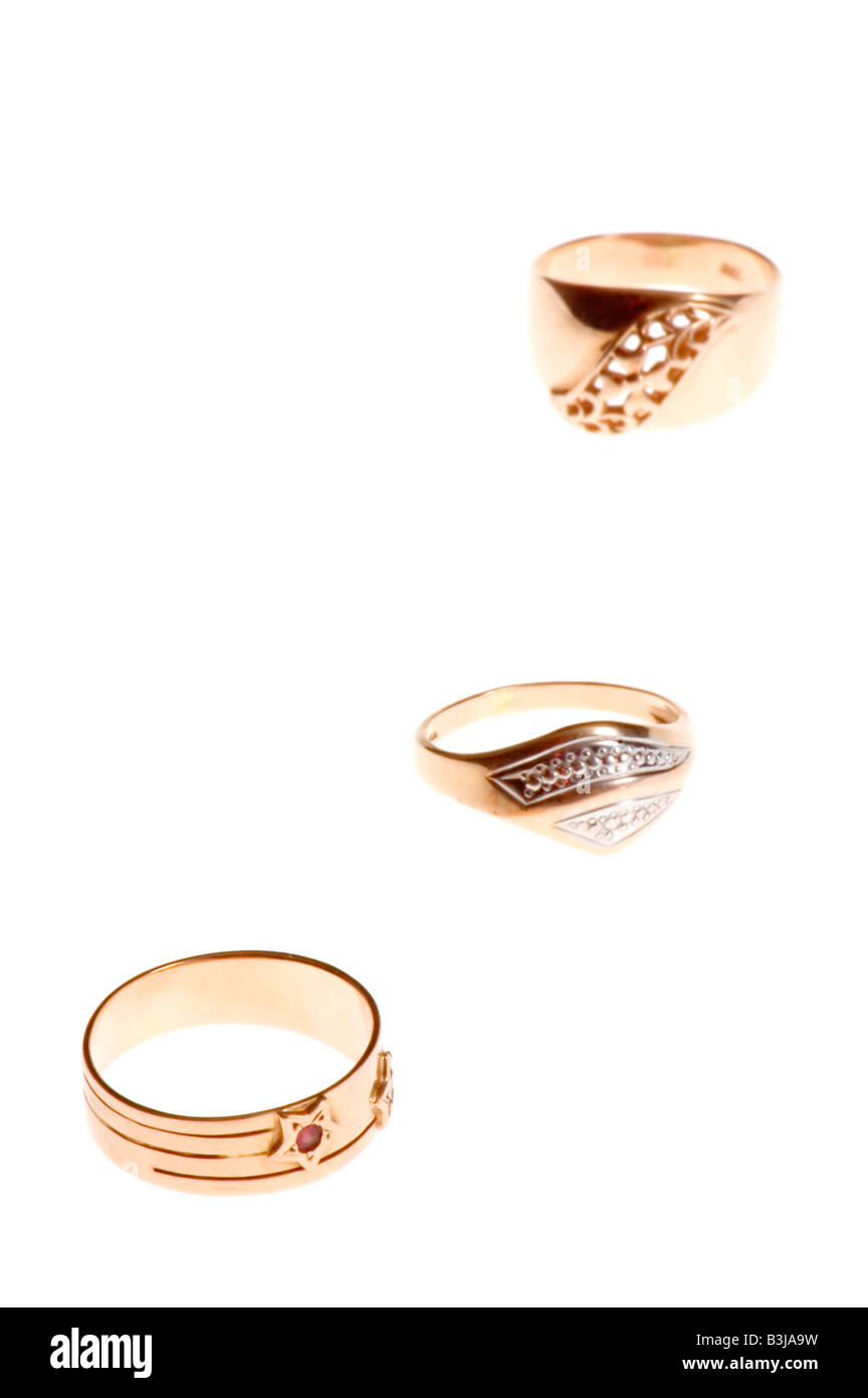 object on white Golden rings macro Stock Photo - Alamy