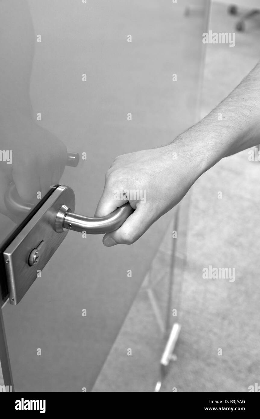 hand opening a glass door Stock Photo - Alamy