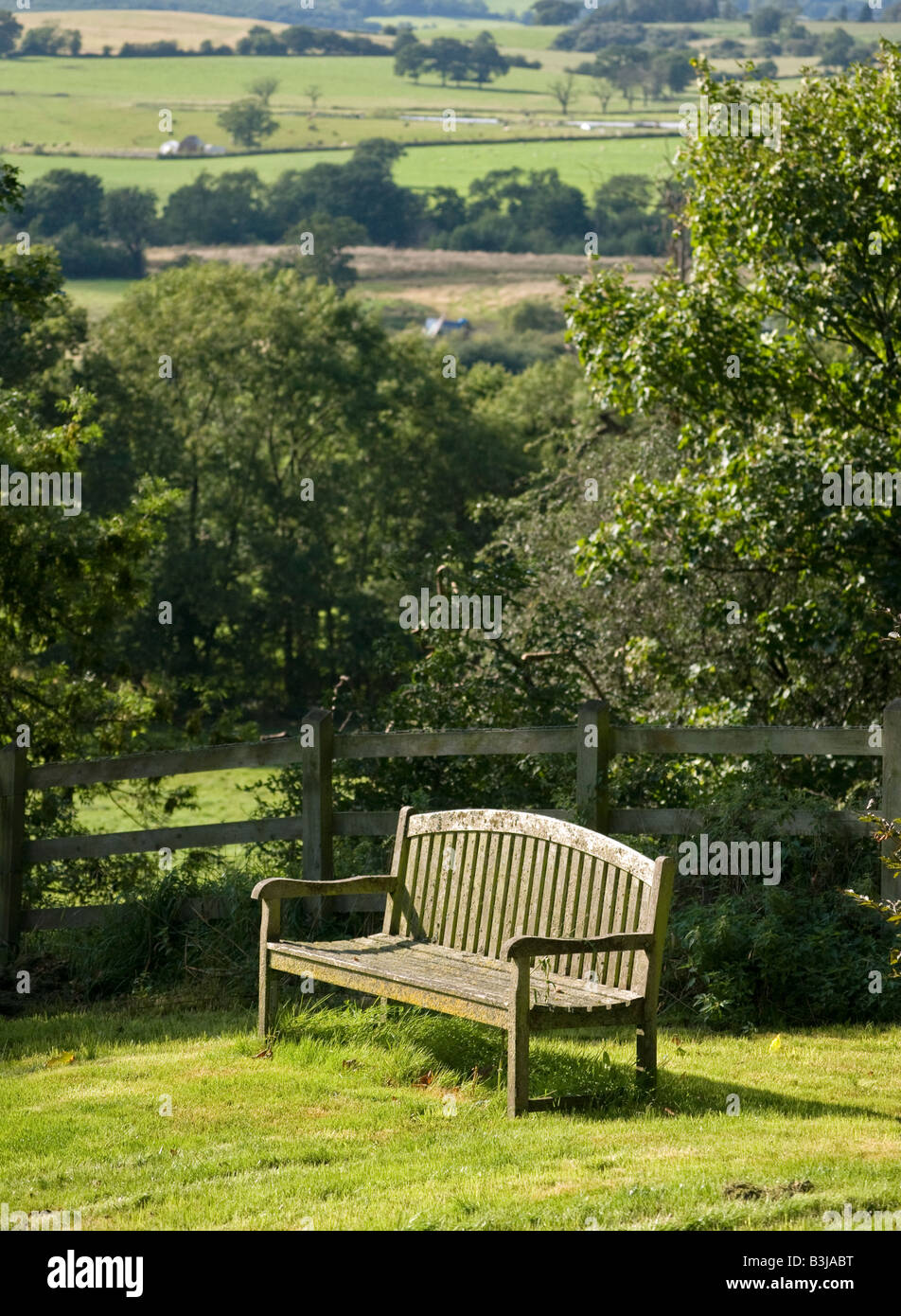a bench in the countryside Stock Photo - Alamy
