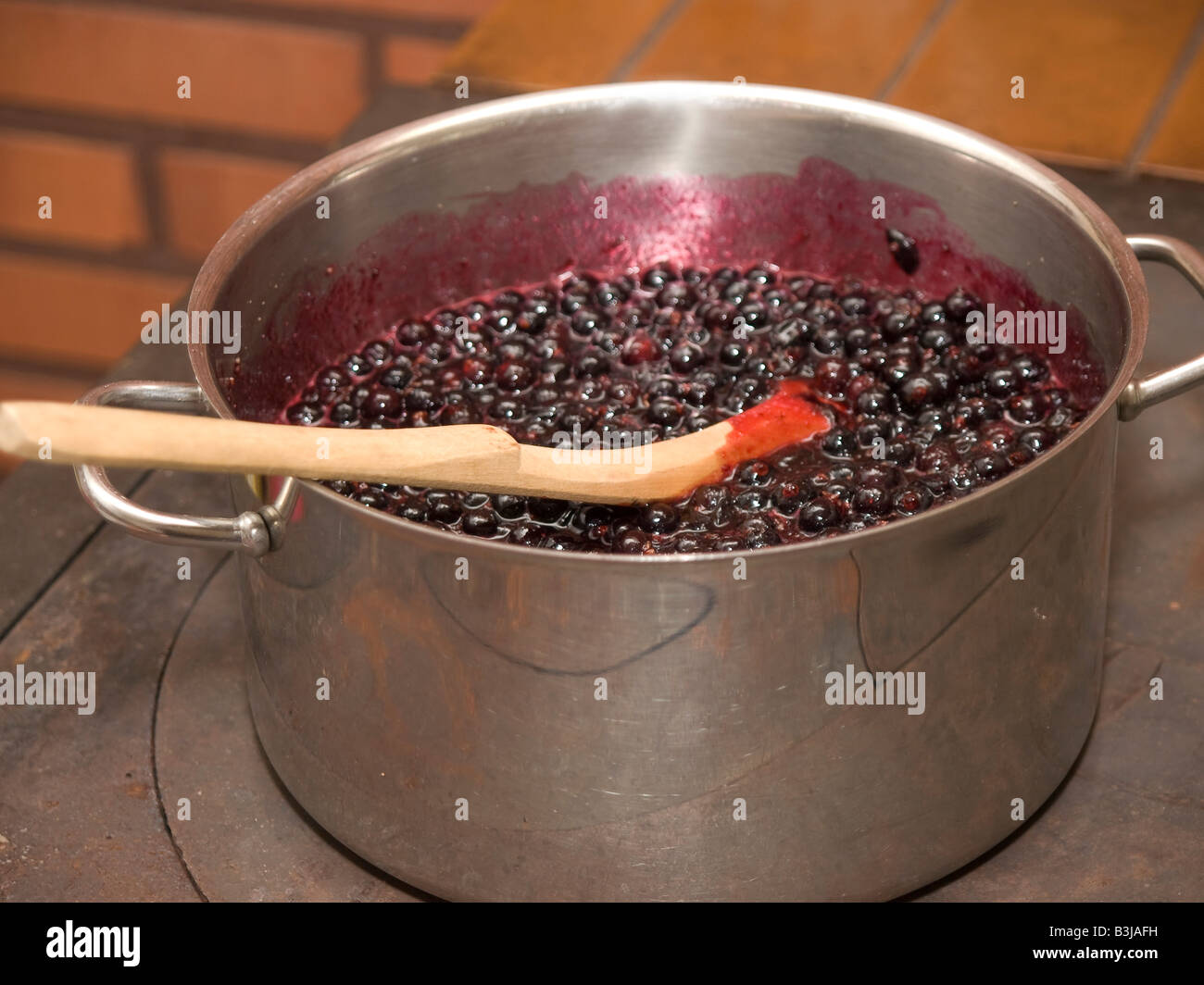 Jam cooking in pot hi-res stock photography and images - Alamy