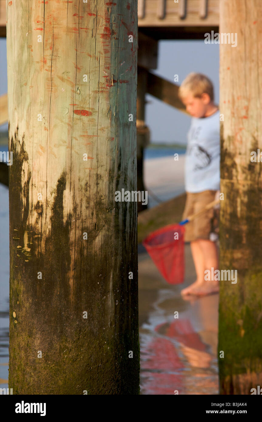 Boy fish net hi-res stock photography and images - Alamy